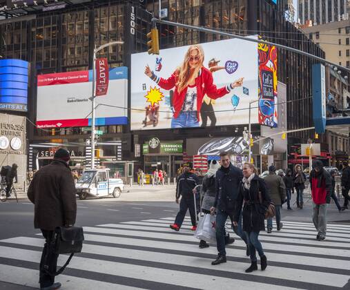 Tommy Hilfiger promotion in New York Pedestrians cross Broadway in Times Square in New York on
