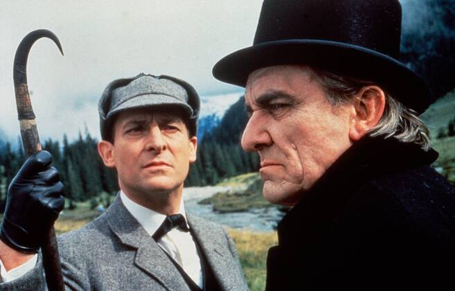 THE ADVENTURES OF SHERLOCK HOLMES, from left: Jeremy Brett, Eric Porter ...